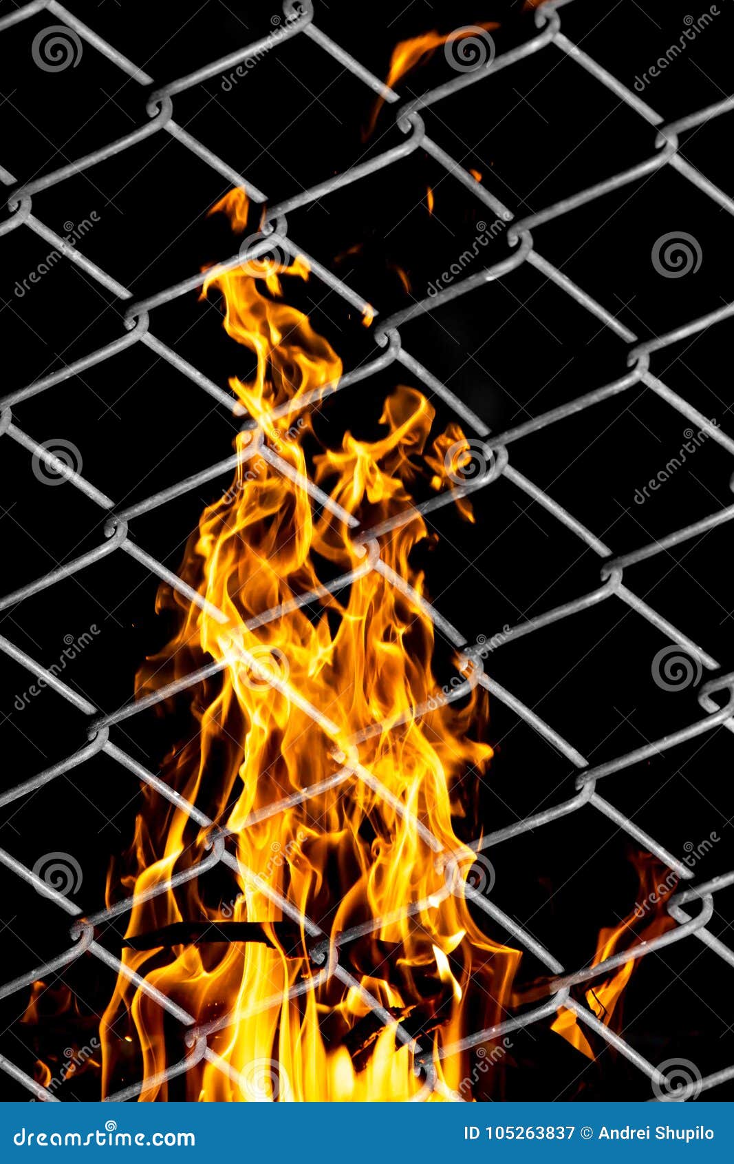 Fire in a metal grid stock image. Image of industry - 105263837