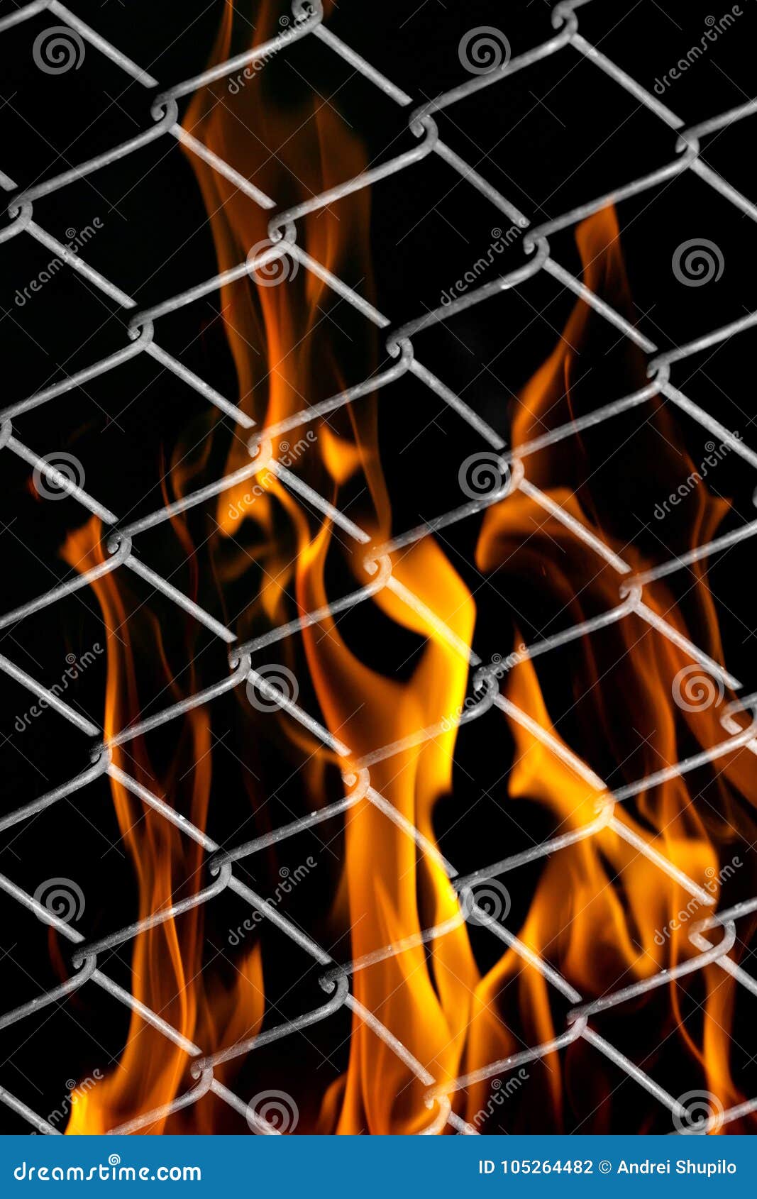 Fire in a metal grid stock photo. Image of closeup, danger - 105264482