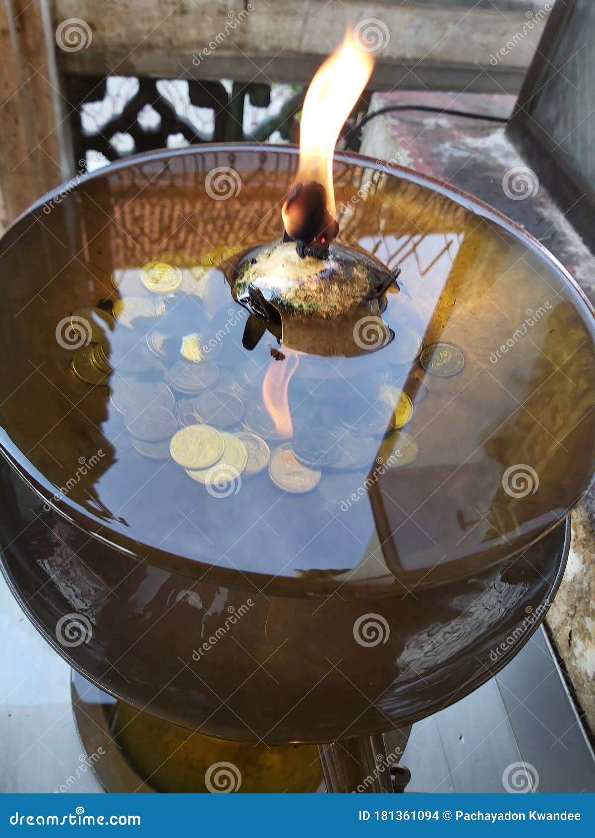 The fire in the oil lamp stock photo. Image of fire - 181361094