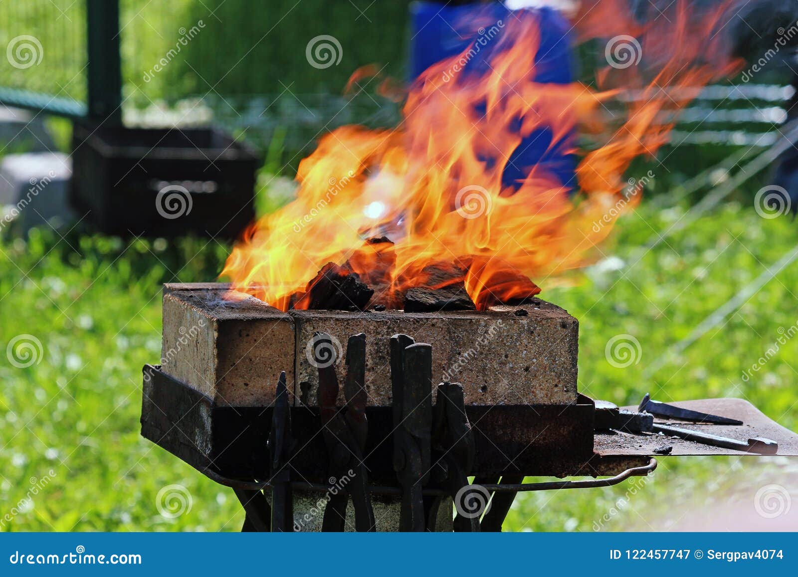 Fire in the open-air forge stock image. Image of anvil - 122457747