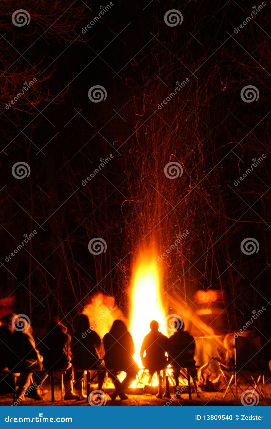 Fire with People Sitting Around Stock Photo - Image of orange ...