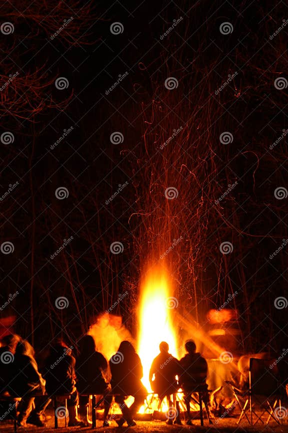 Fire with People Sitting Around Stock Photo - Image of orange ...