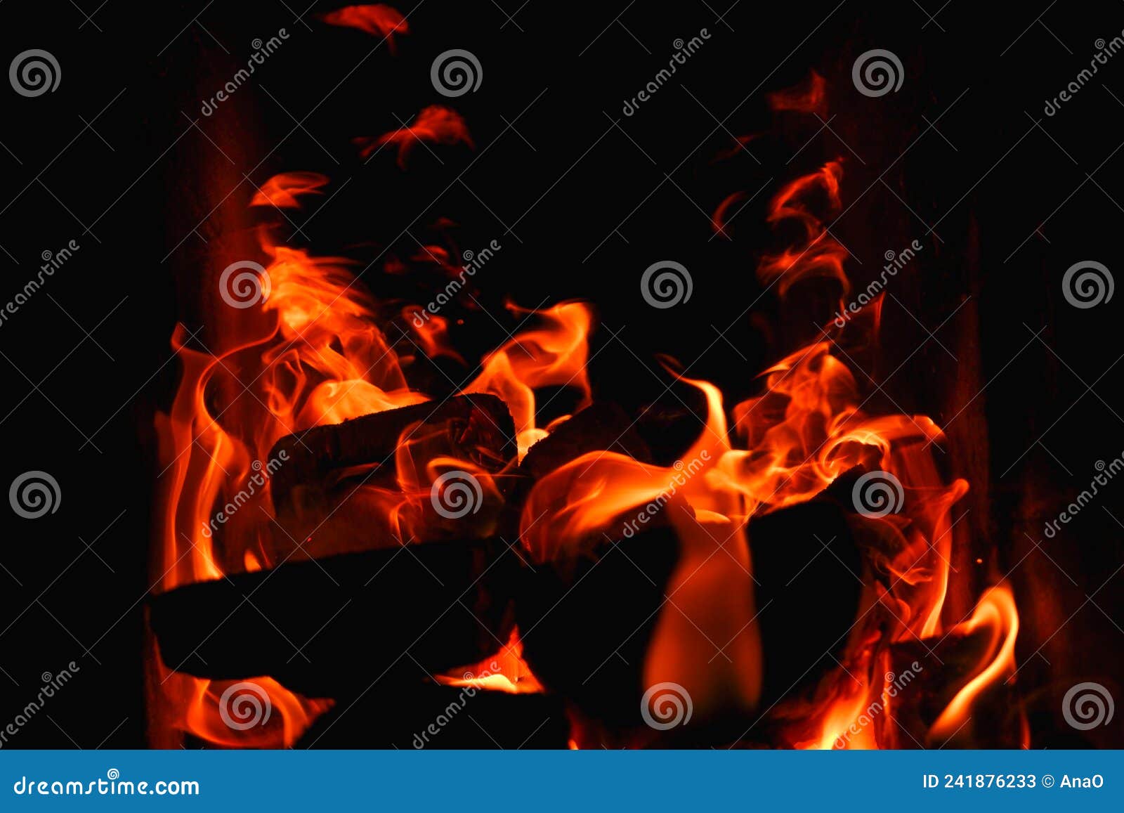 Fire. Photo of Flames Devouring Firewood in a Stone Fireplace. the ...