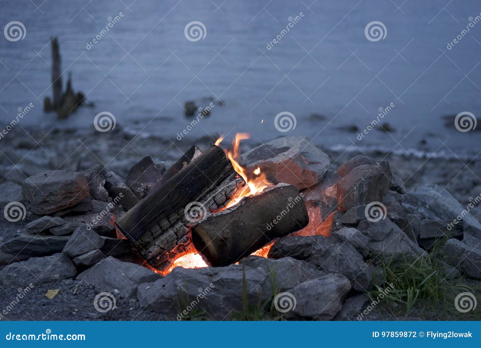 Fire Pit by the Water. stock photo. Image of happy, blue - 97859872