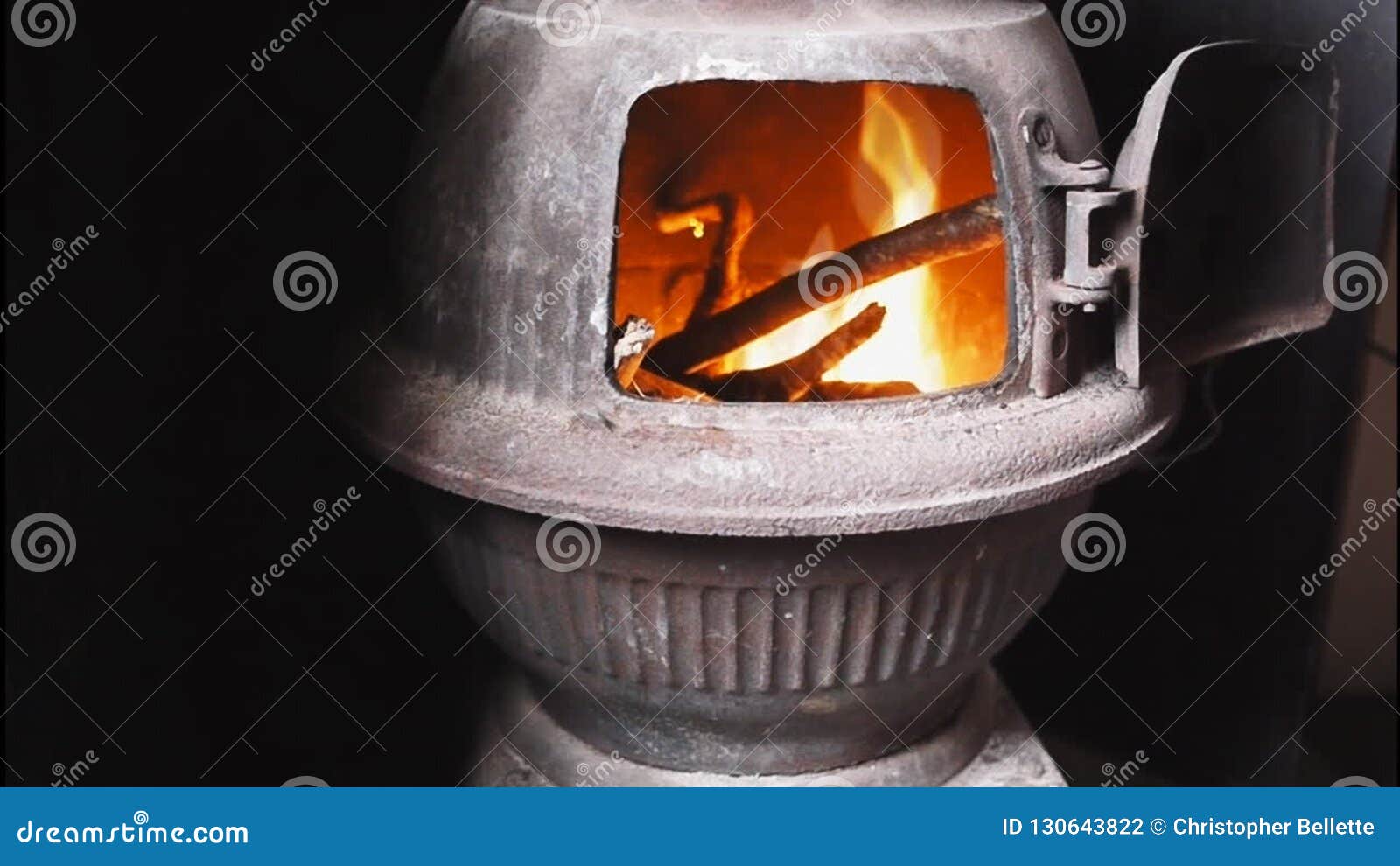 Fire in a pot belly stove stock footage. Video of flames - 130643822