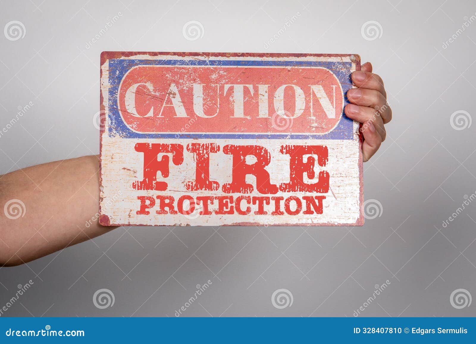 Fire Protection. Caution Sign with Text in Hand Stock Photo - Image of ...