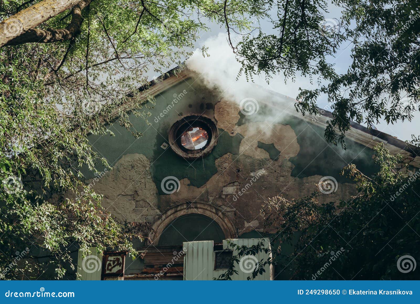 A Fire on the Roof of an Old Abandoned Building Stock Photo - Image of ...