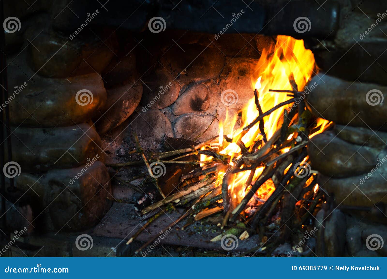 Fire in a rustic fireplace stock image. Image of house - 69385779