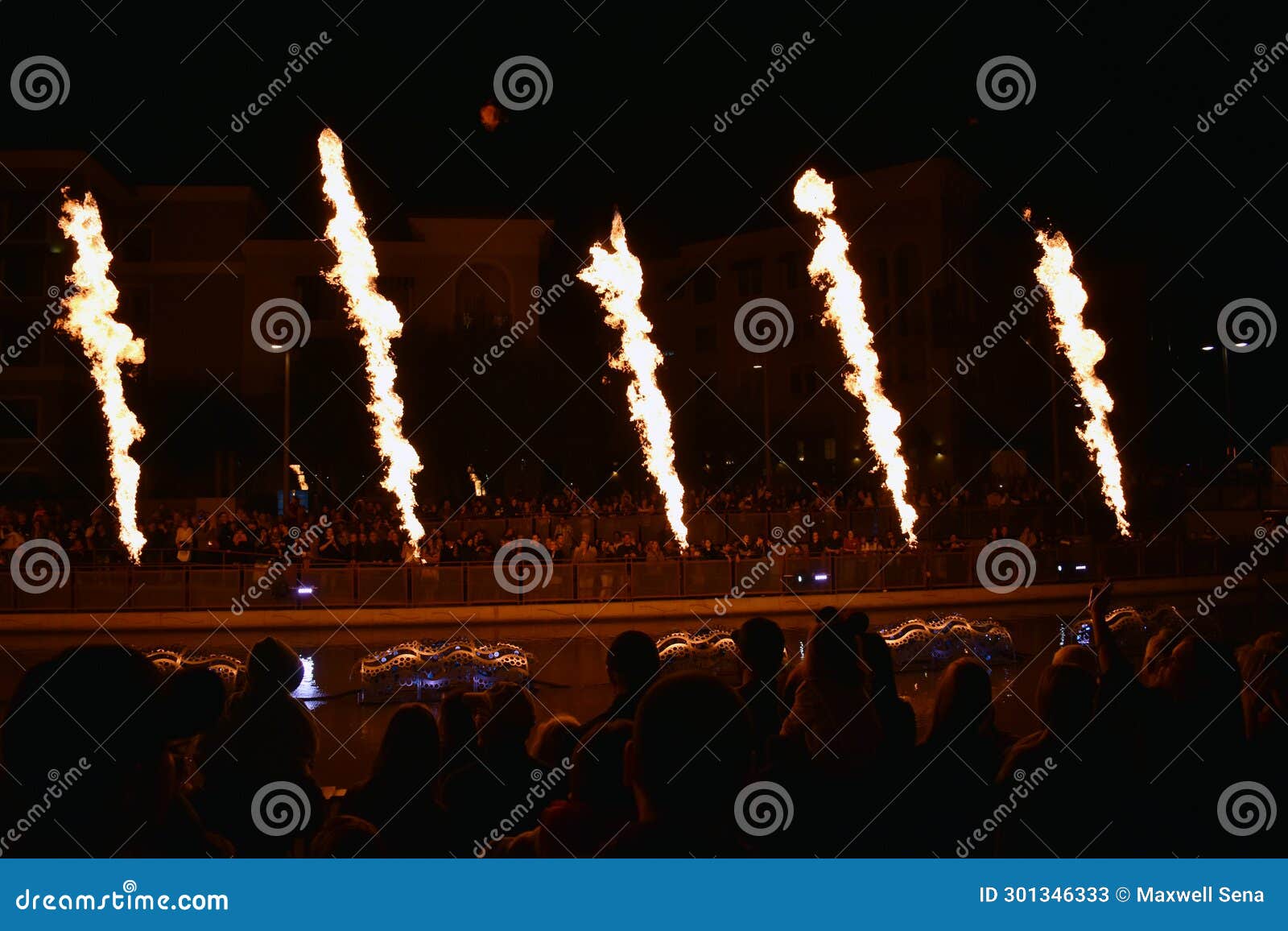 Fire Shooting Up from a River Sculpture Stock Image - Image of person ...