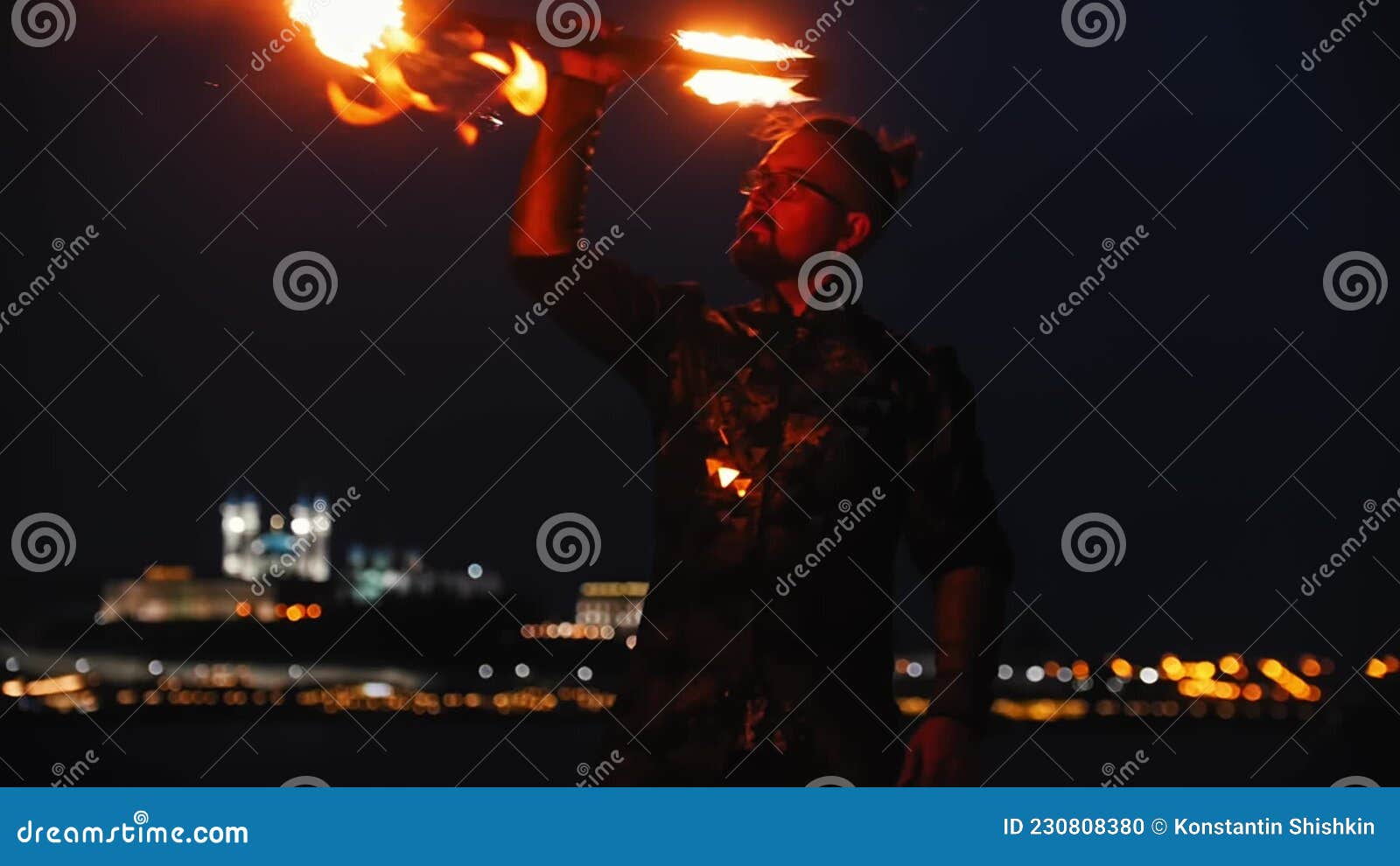 Fire Show - a Man Dancing with a Fire Torch on the Night Beach Stock ...