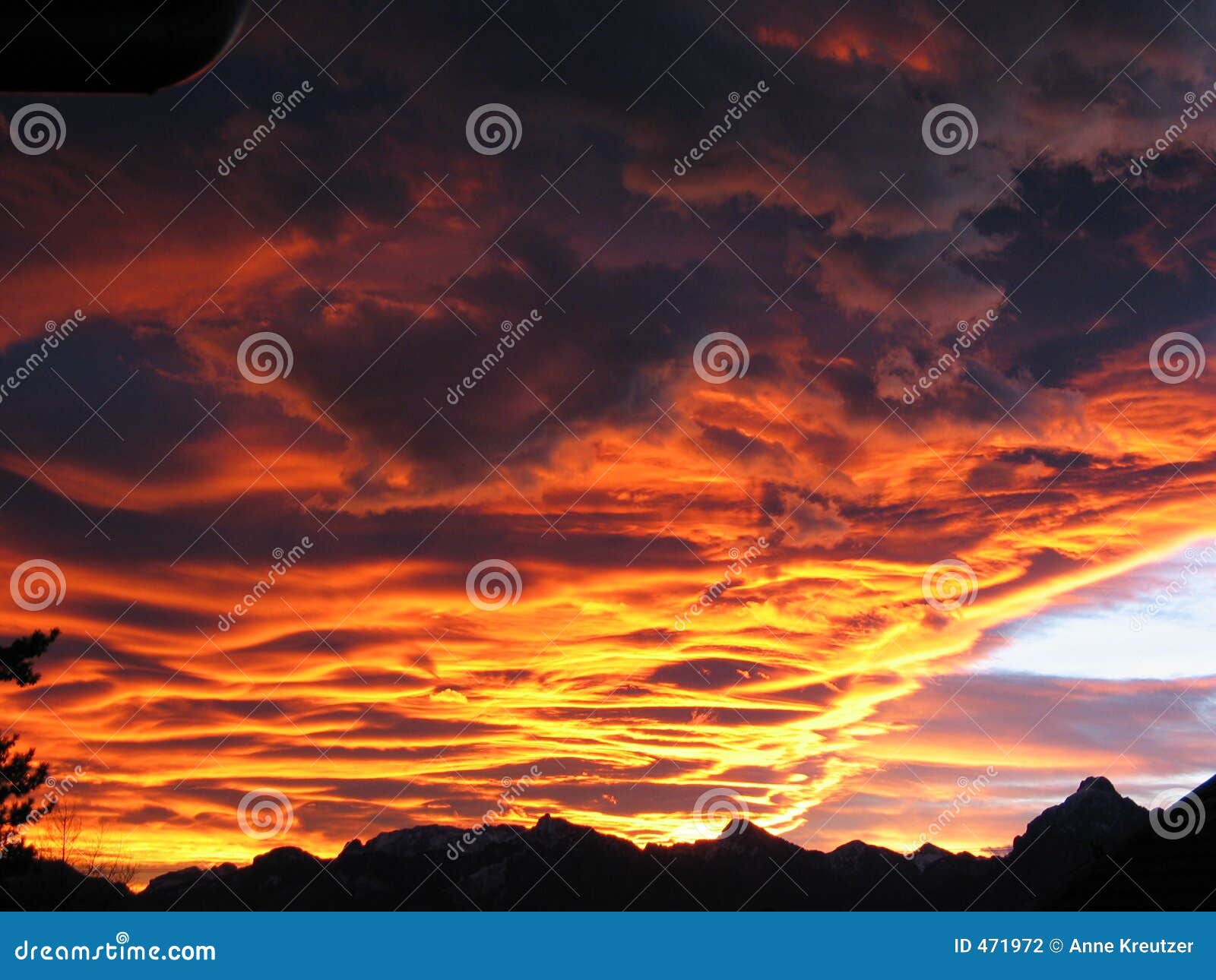 Fire in the sky stock photo. Image of sunup, flames, colors - 471972