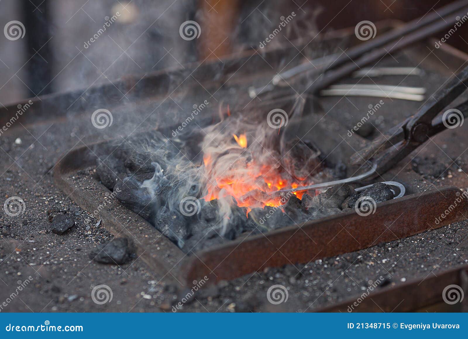 Fire On A Blacksmith. Blacksmith At Work. Dark Background. Splinters Of ...