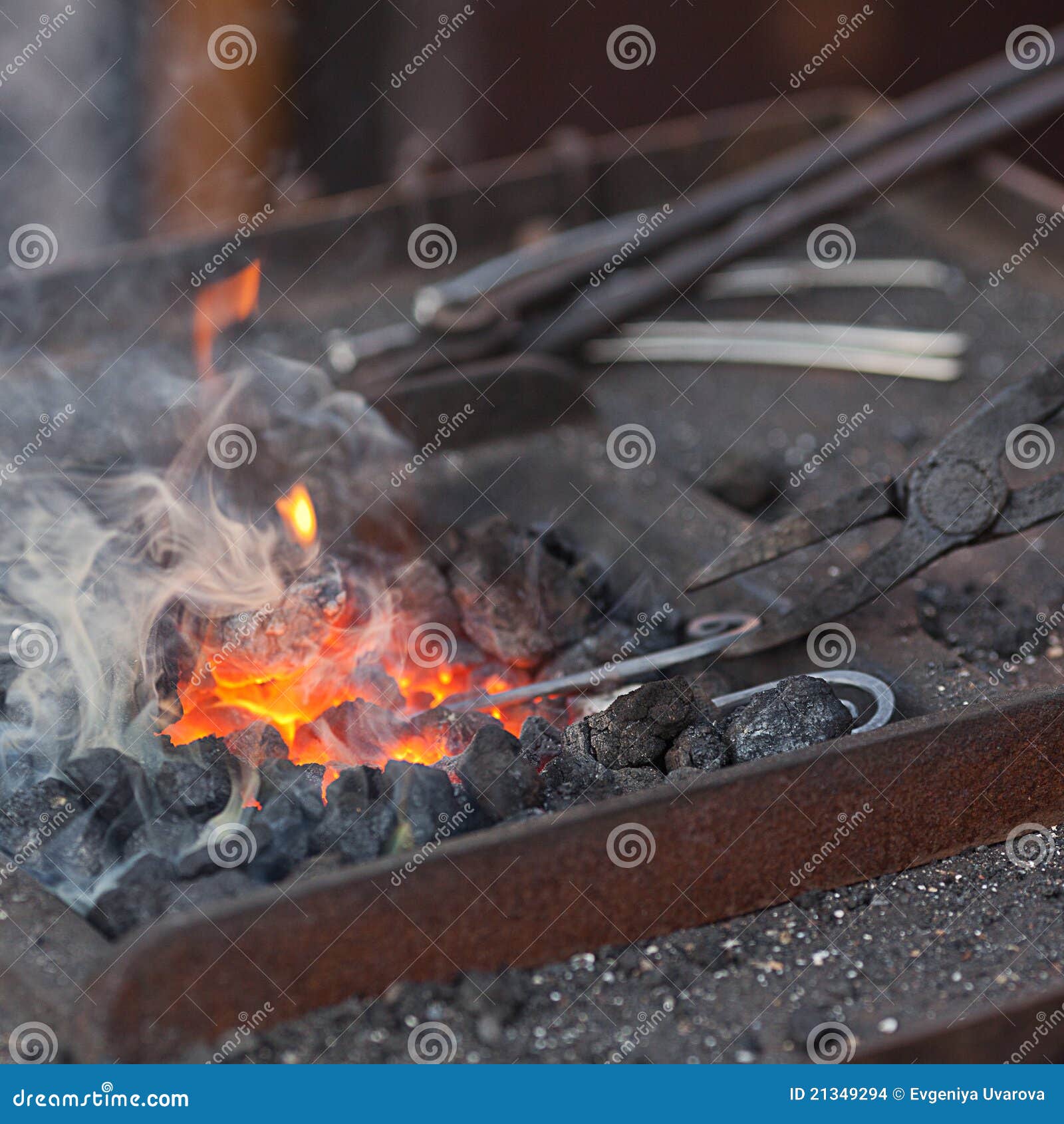 Fire On A Blacksmith. Blacksmith At Work. Dark Background. Splinters Of ...