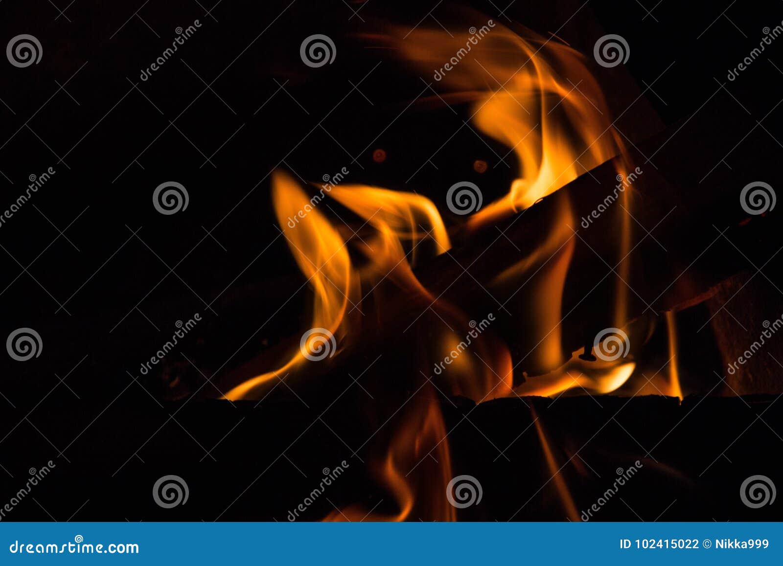 Eyes of the Monster in the Fire. Stock Photo - Image of relax, light ...