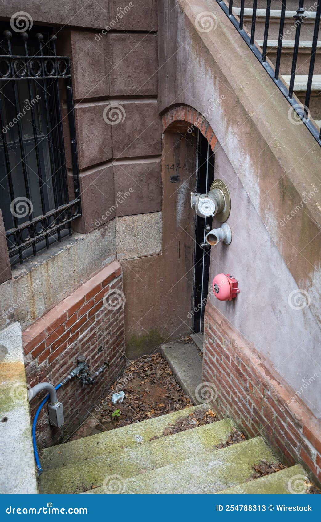 Fire Sprinkler Connection and Bell Outside a Building Stock Image ...