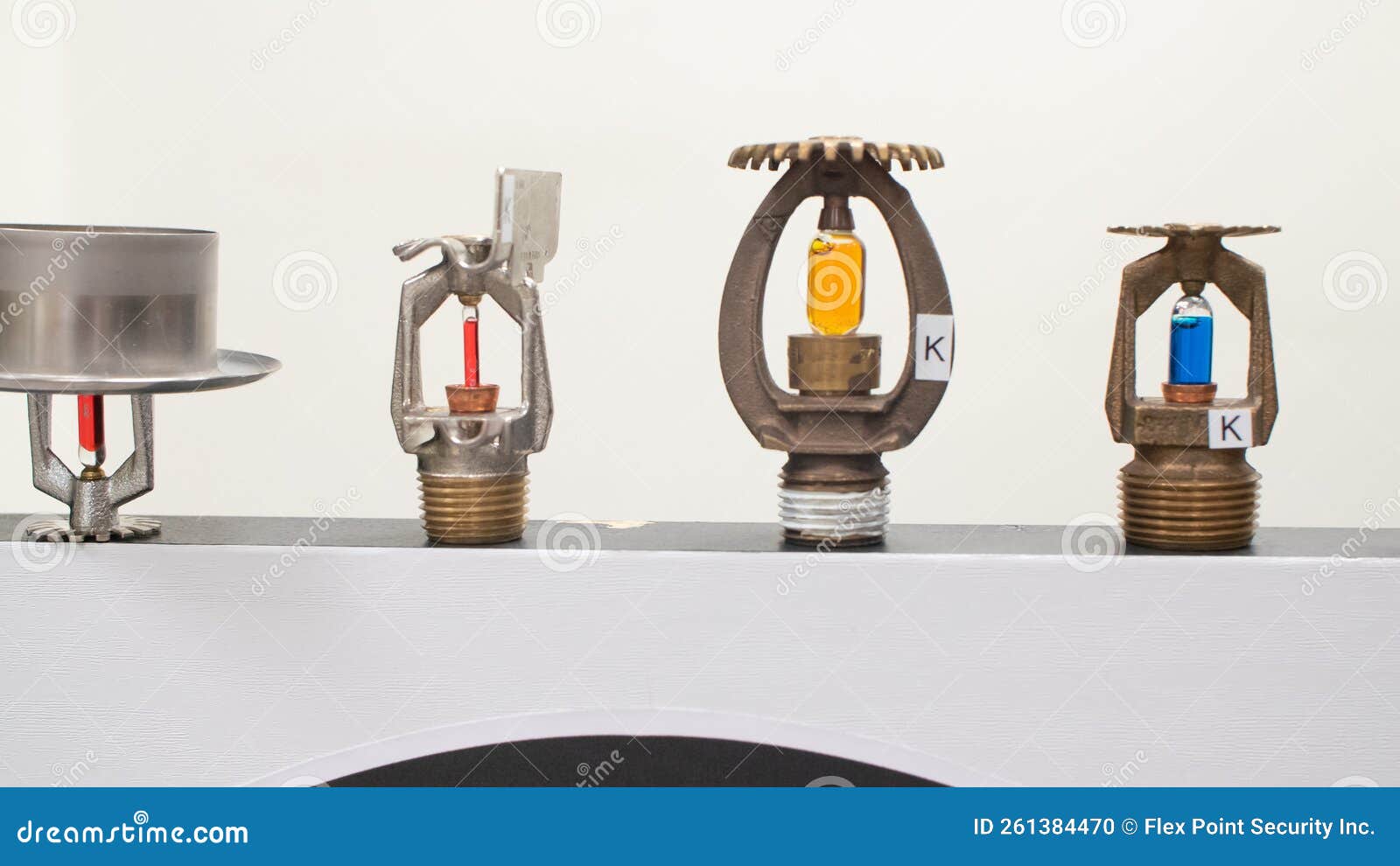 Fire Sprinkler Heads with Fusible Links and Frangible Bulbs Stock Photo ... Fire Sprinkler Heads with Fusible Links and Frangible Bulbs Stock Photo ...