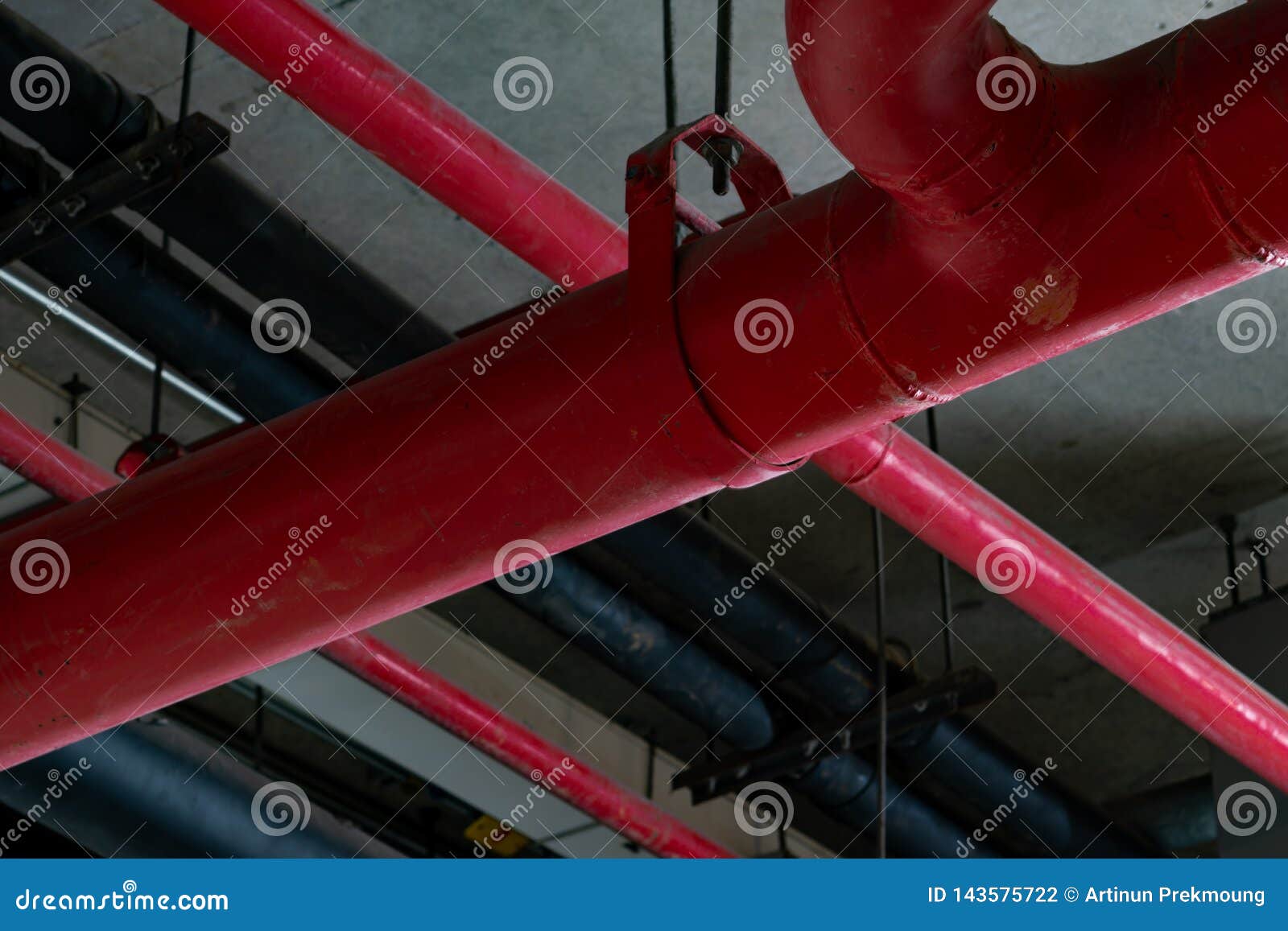 Fire Sprinkler System With Red Pipes Hanging From Ceiling Inside ...