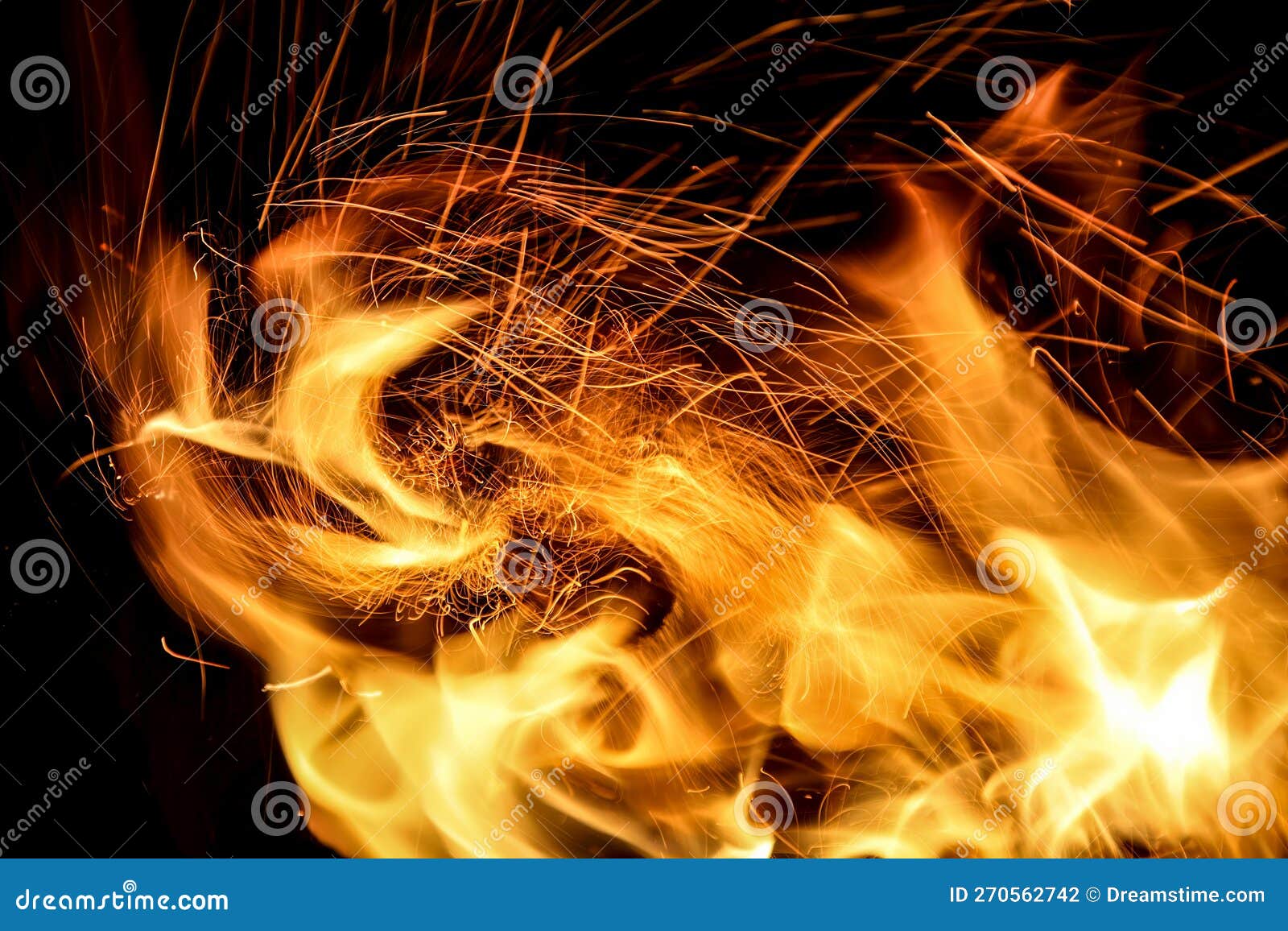 Fire with Swirls of Sparks in the Night Stock Photo - Image of blaze ...