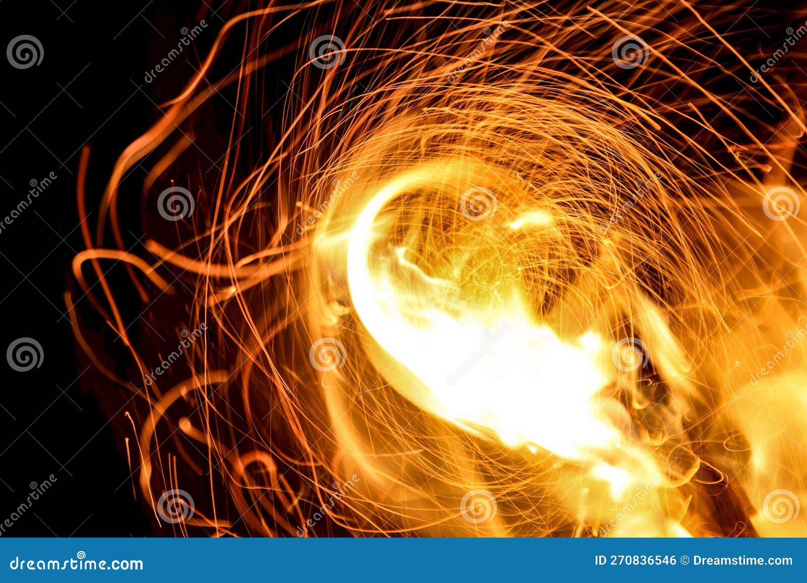 Fire with Swirls of Sparks in the Night Stock Photo - Image of ...