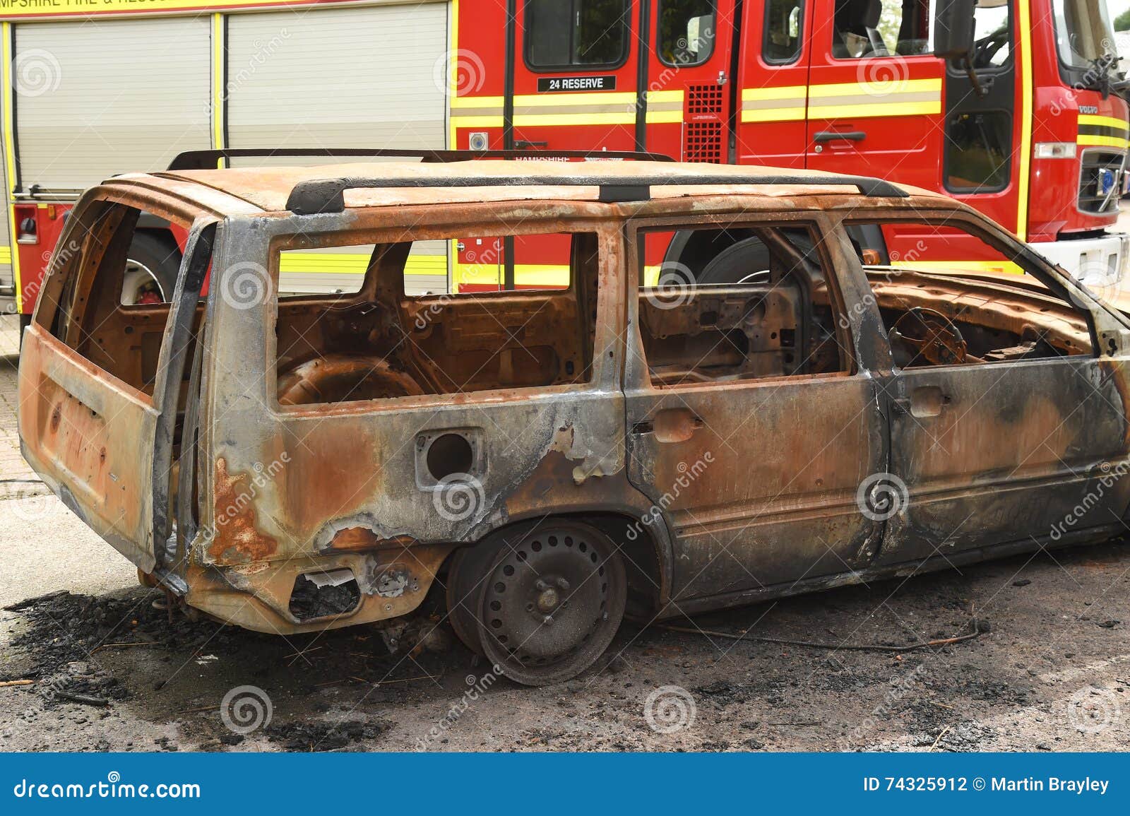 Fire Tender at a Car Fire Burnt Out Vehicle Editorial Photography ...