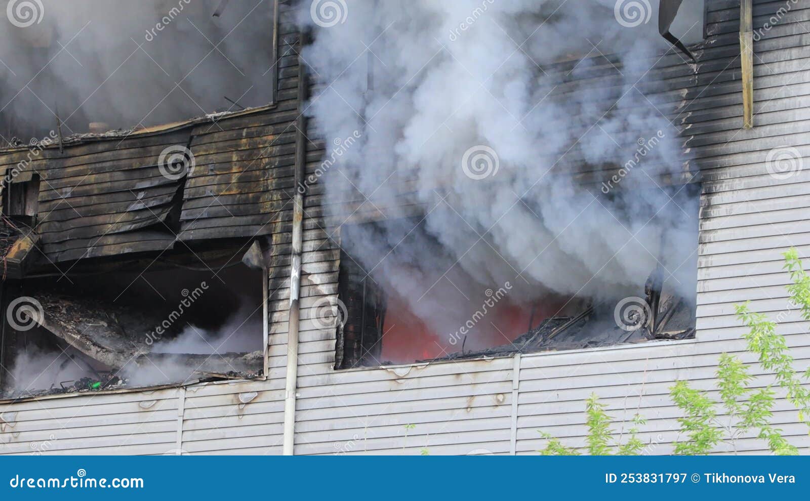 Smoke and Fire from a Window in a Warehouse during a Fire Stock Video ...