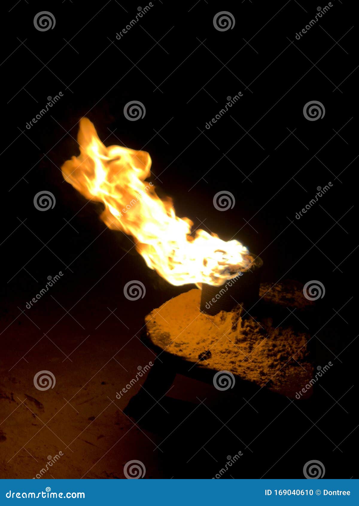 Fire torches at the beach stock photo. Image of leisure - 169040610