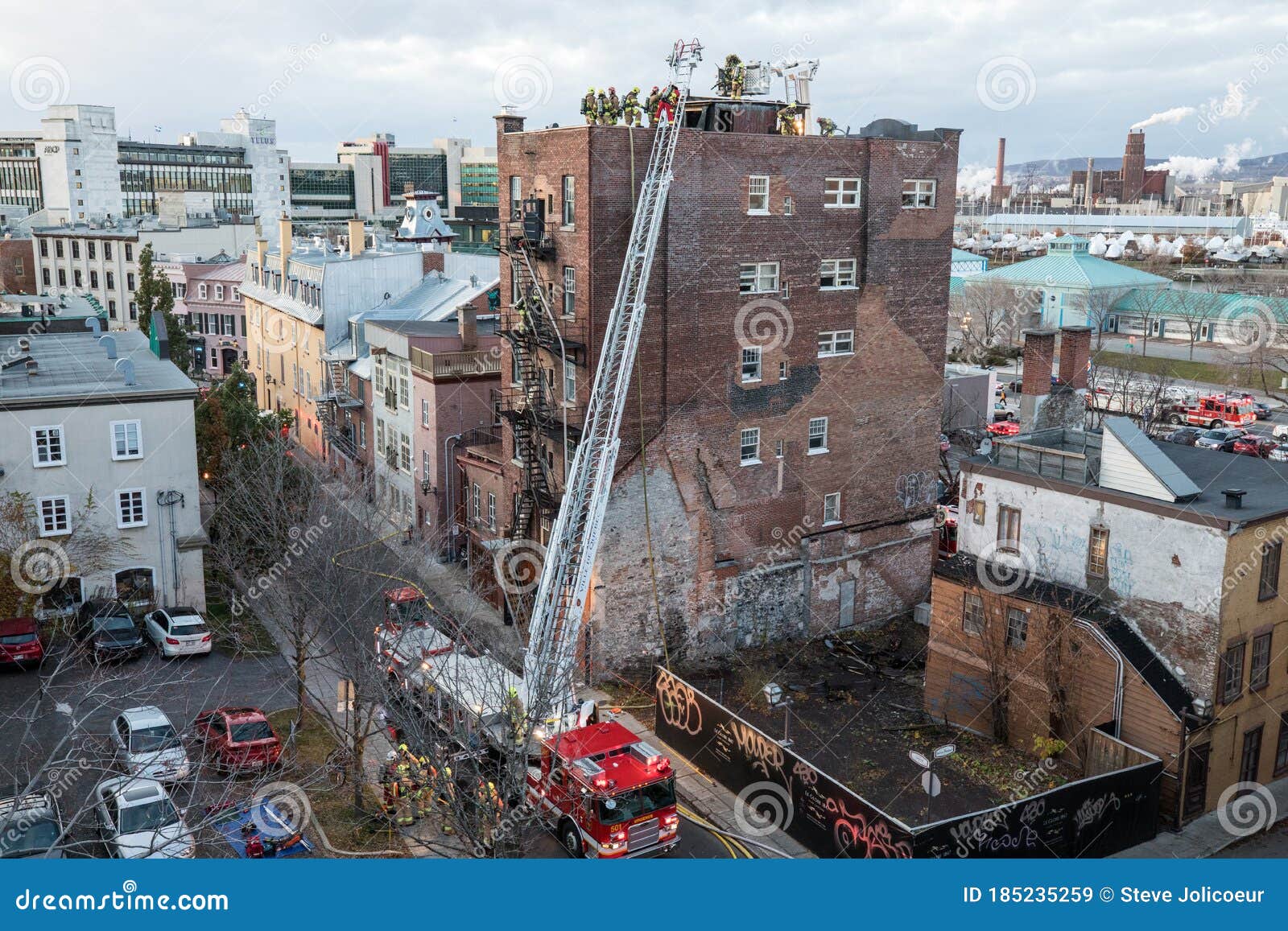 Fire Truck Ladder Around Building on Fire. Editorial Stock Image ...