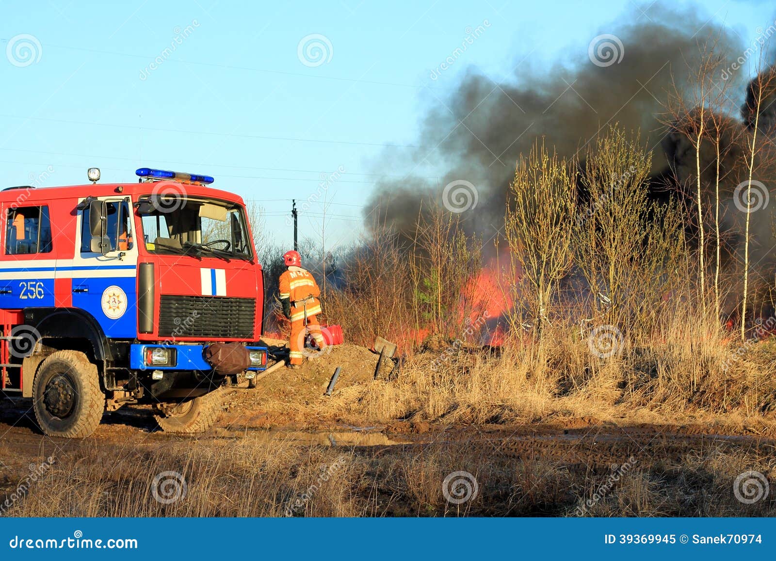 Fire trucks editorial image. Image of field, work, plant - 39369945
