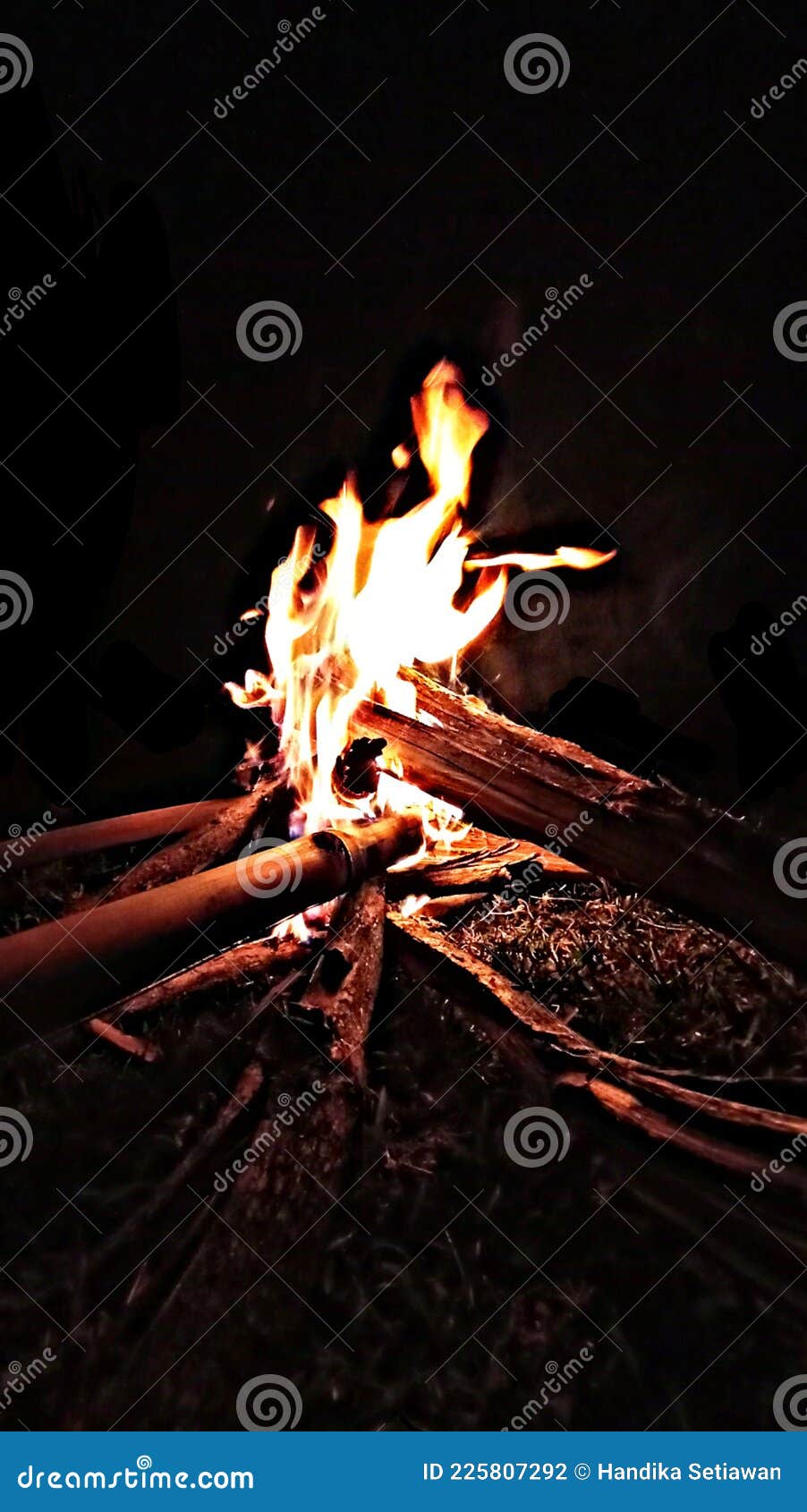 Fire on a very cold night stock photo. Image of person - 225807292