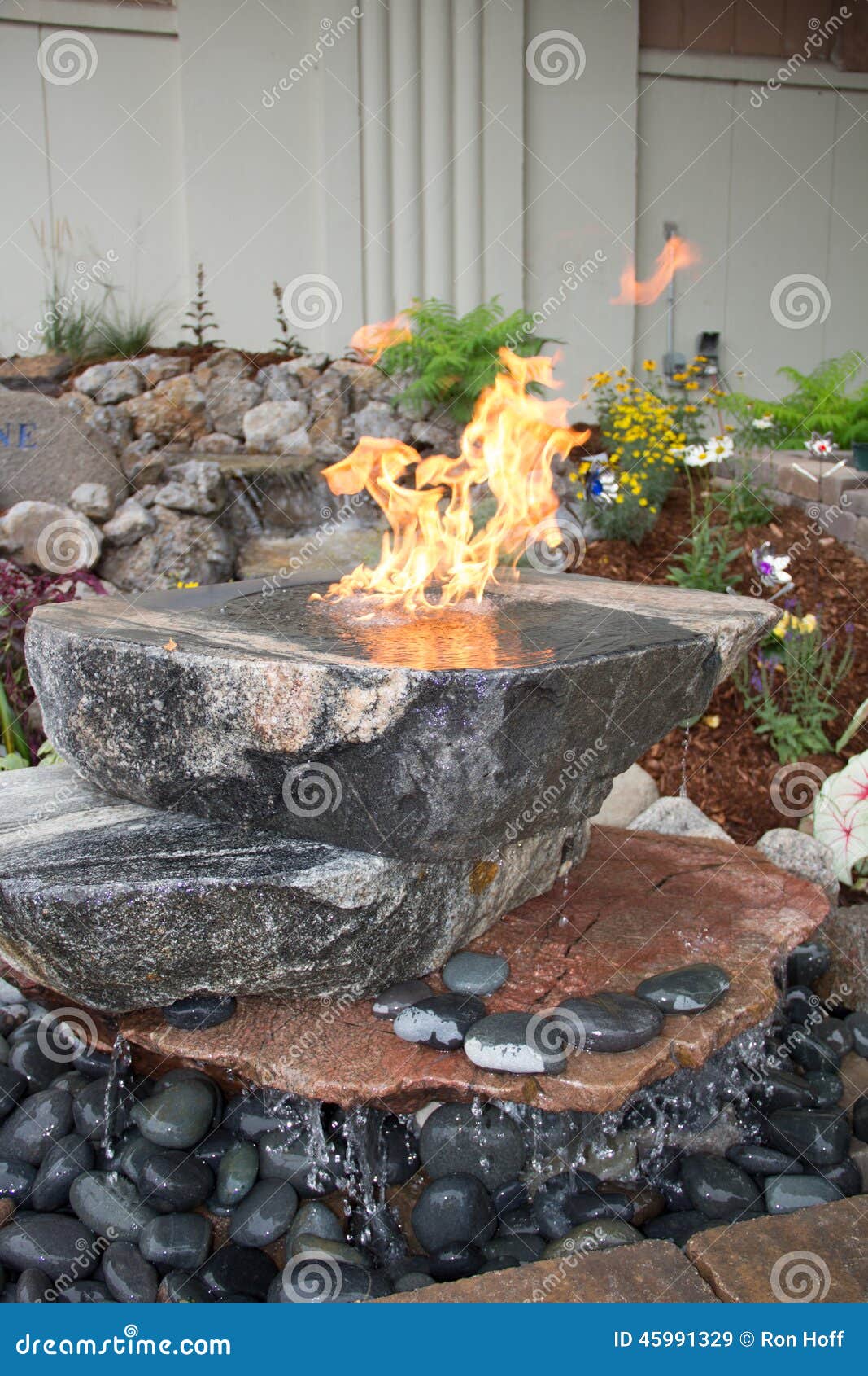Fire on Water stock image. Image of rocks, backyard, fire - 45991329
