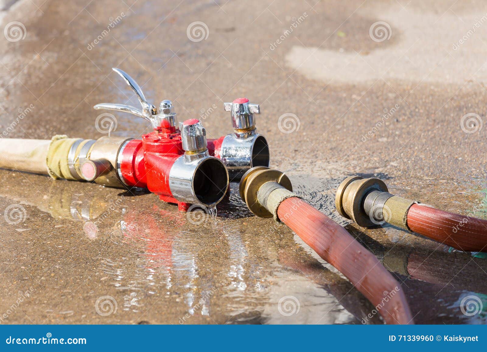Fire Water Hose Connector on the Ground Stock Photo - Image of water ...