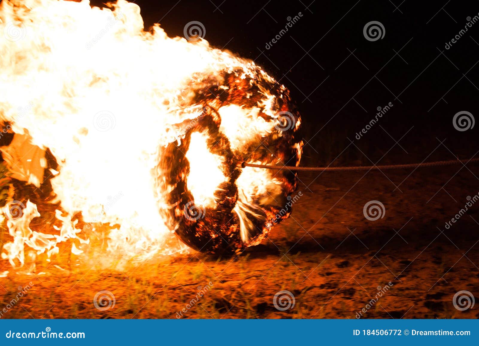Fire Wheel on the Background of the Night Sky and the Sandy Beach Stock ...