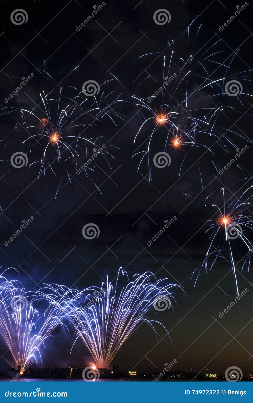 Fire works and water stock photo. Image of reflection - 74972322