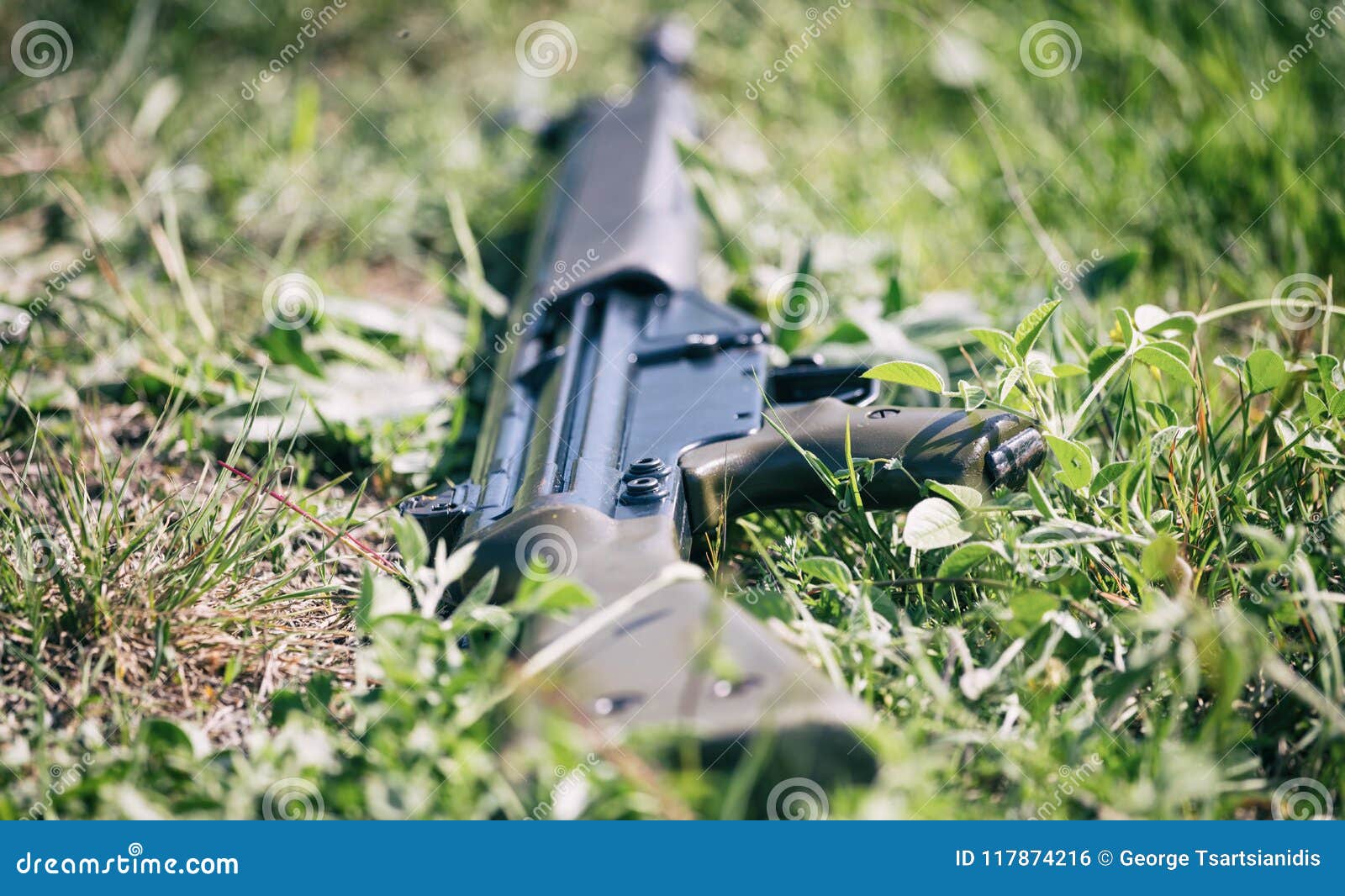 Shotgun on Easel. Front Side of Weapon with Close Up View on Blurred ...