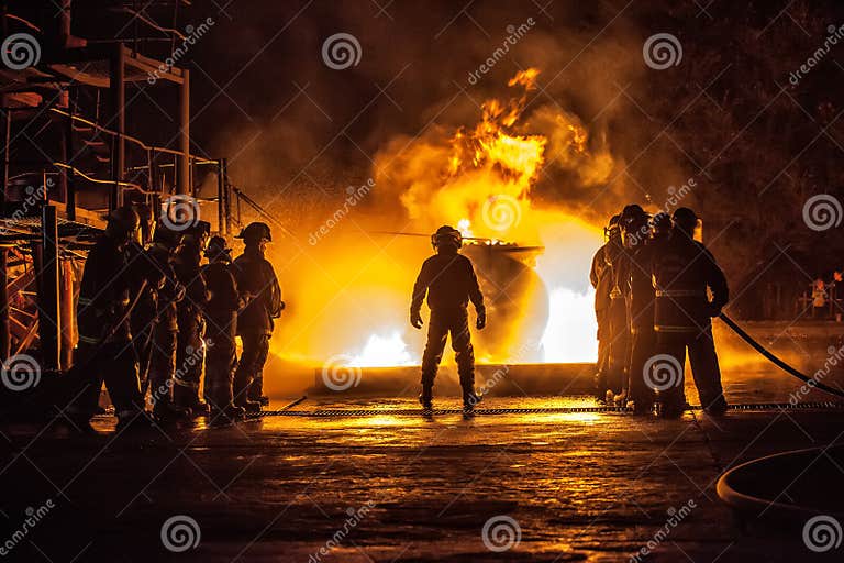 A Firechief Controlling Two Teams Fighting a Fire Editorial Stock Photo ...
