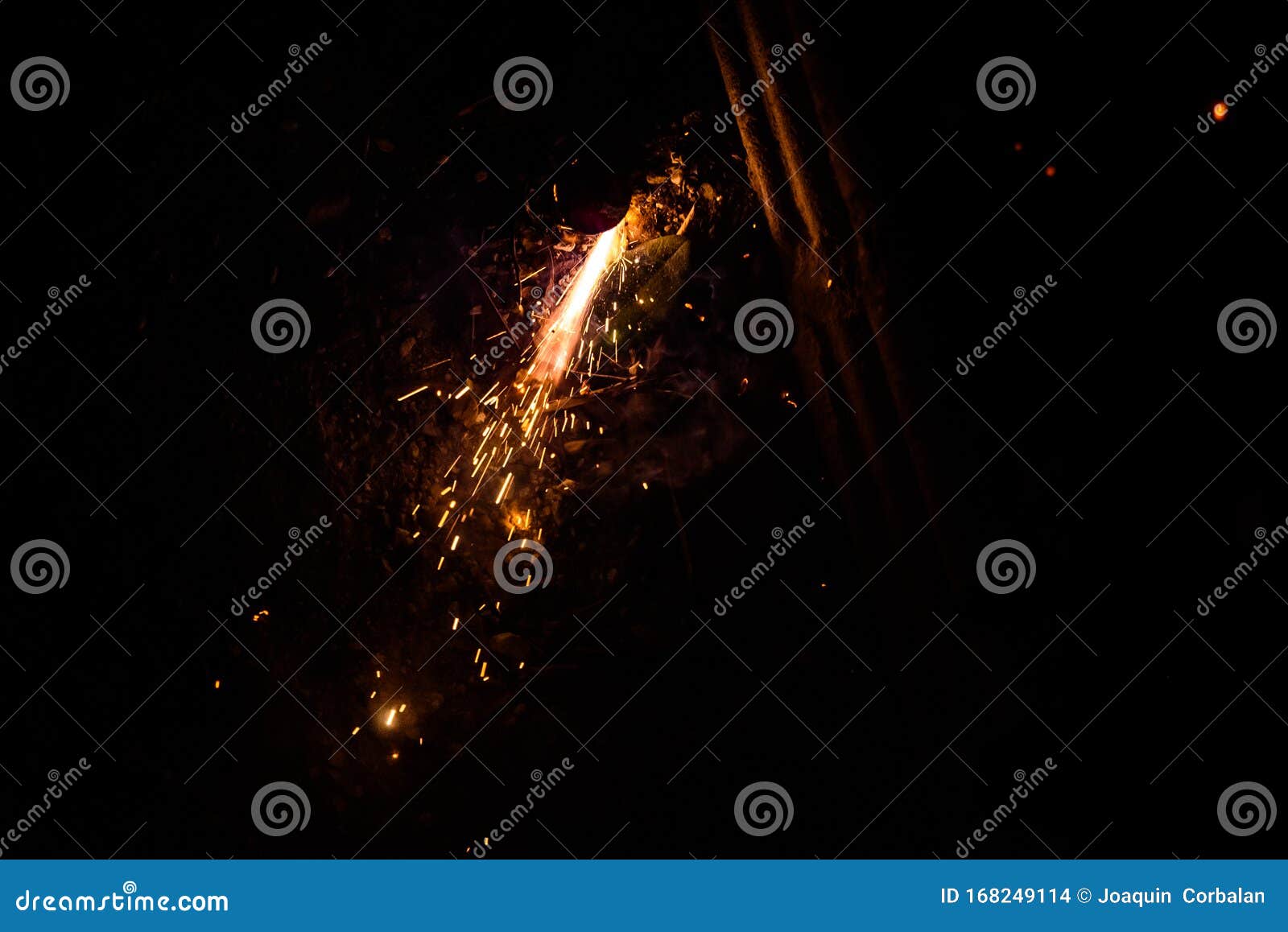 Firecrackers Spinning Over Themselves at Night, Throwing Sparks of Fire ...