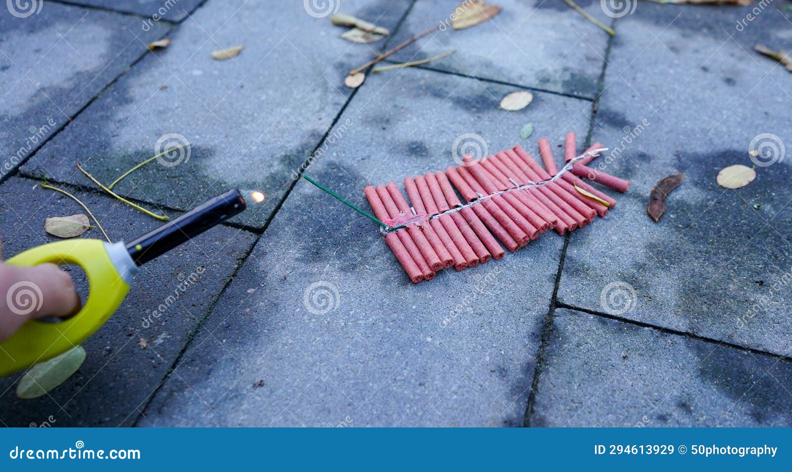Firecrackers Strip on the Ground Stock Image - Image of snow, iron ...