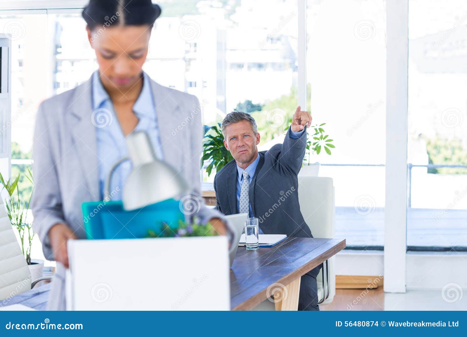 A Fired Businesswoman Holding Box Stock Photo - Image of fire, gesture ...