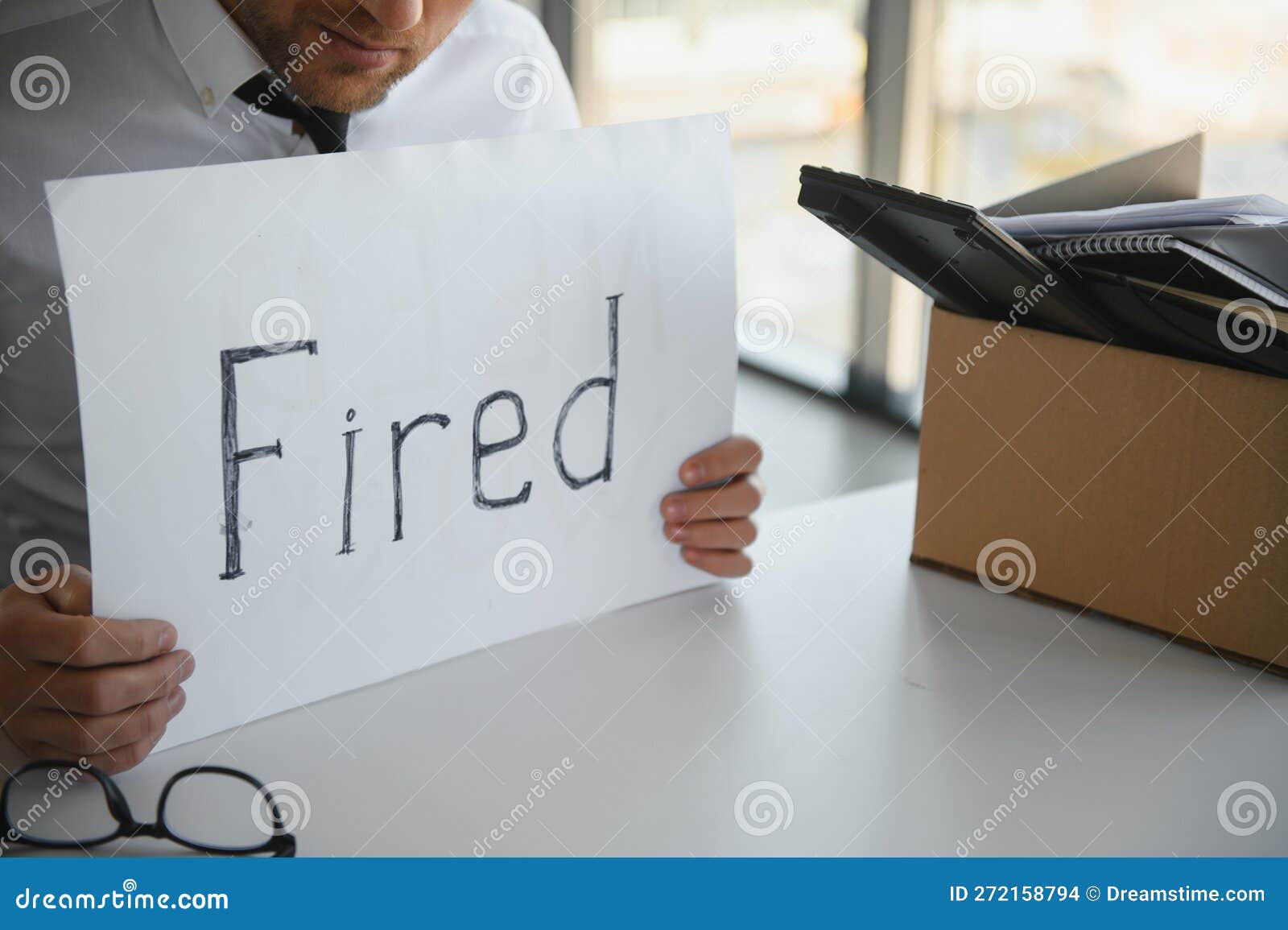 Fired Employee Holding Fired Sign in Hand Stock Photo - Image of ...