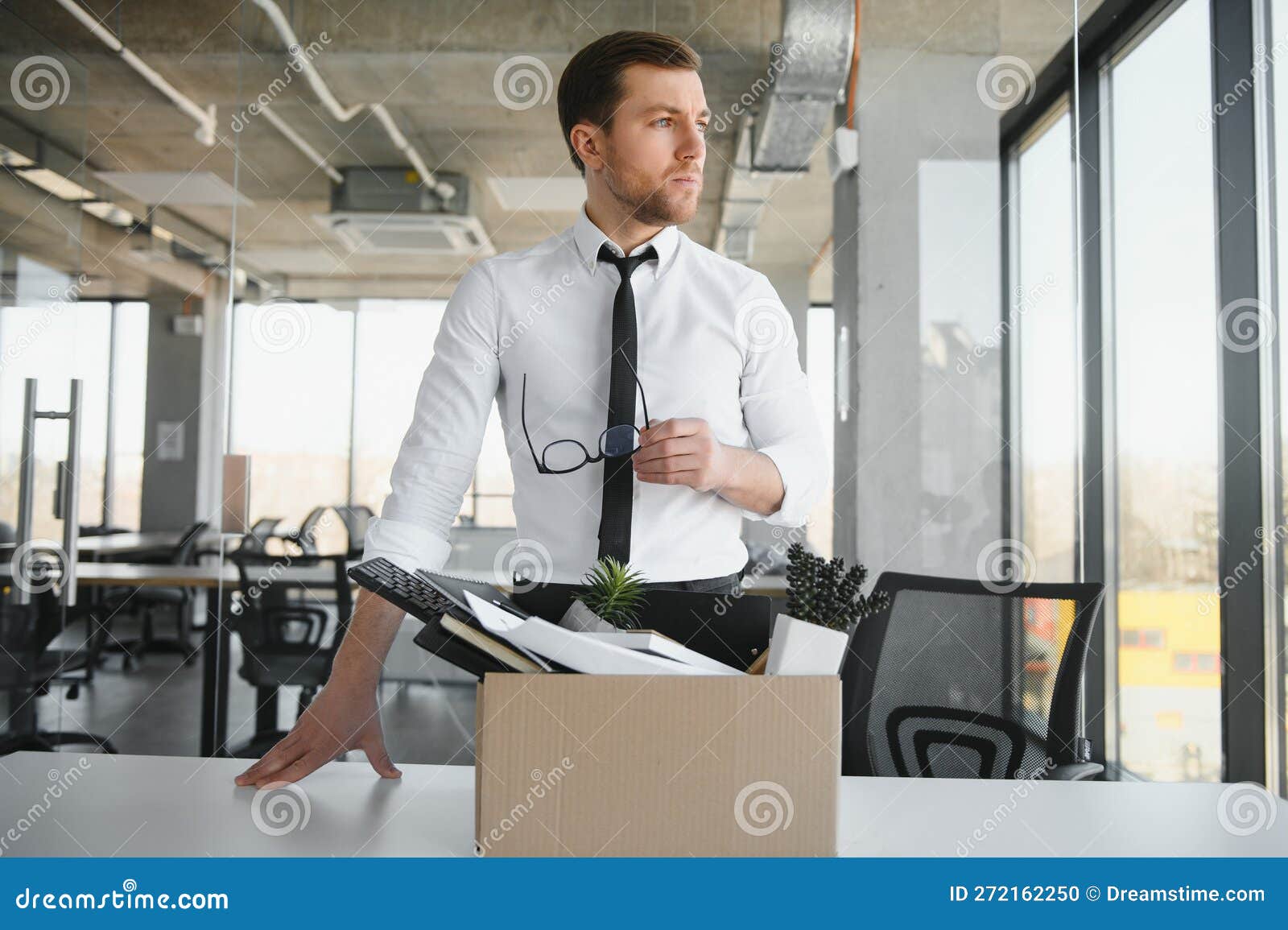 Fired Young Man Packing His Stuff in Office Stock Photo - Image of ...