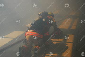 Firefigher and smoke stock image. Image of emergency - 43552829