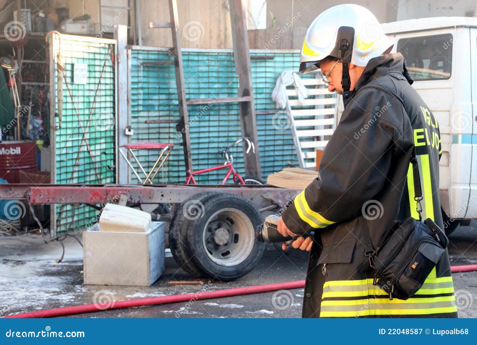 Firefighter editorial photography. Image of instrument - 22048587
