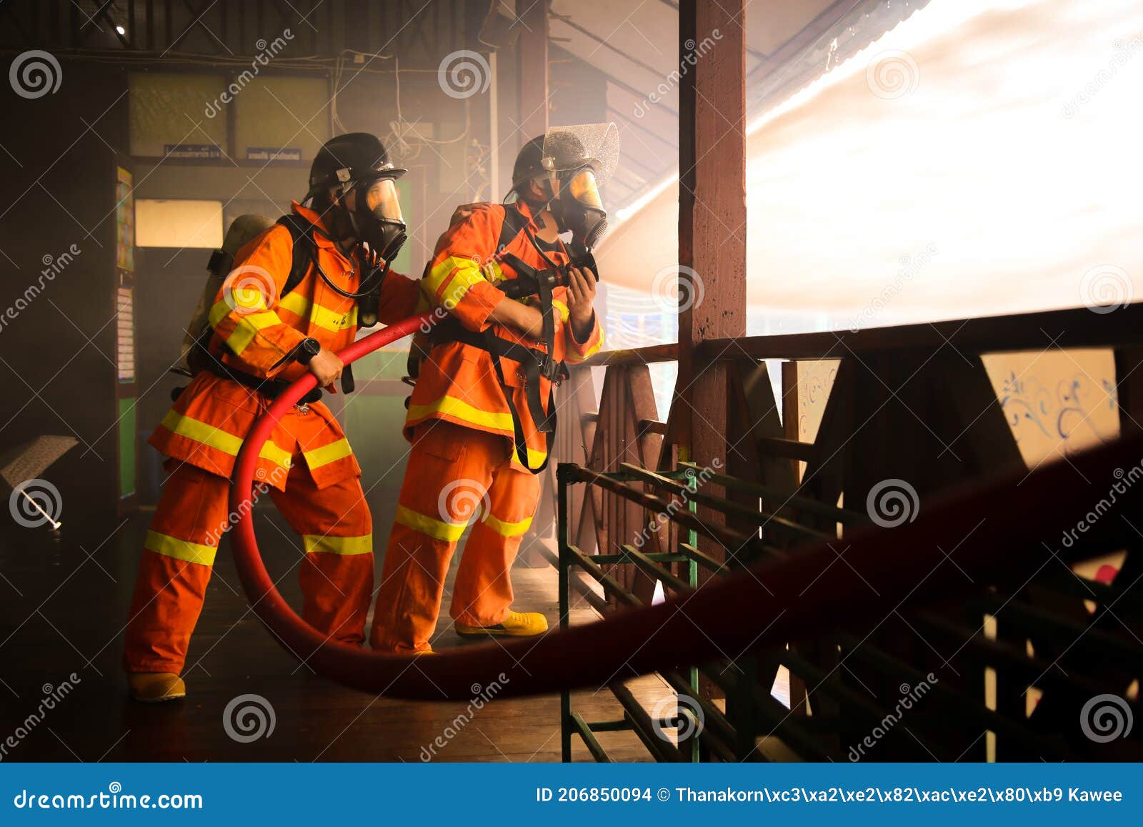 Firefighter in action editorial stock image. Image of buildingn - 206850094