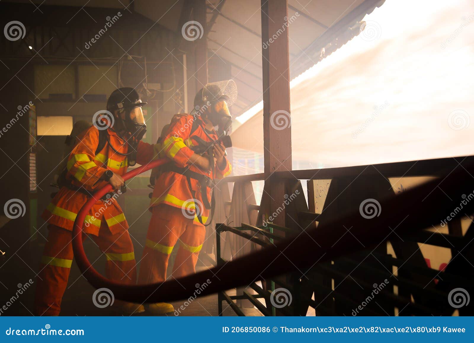 Firefighter in action editorial photo. Image of firefighters - 206850086