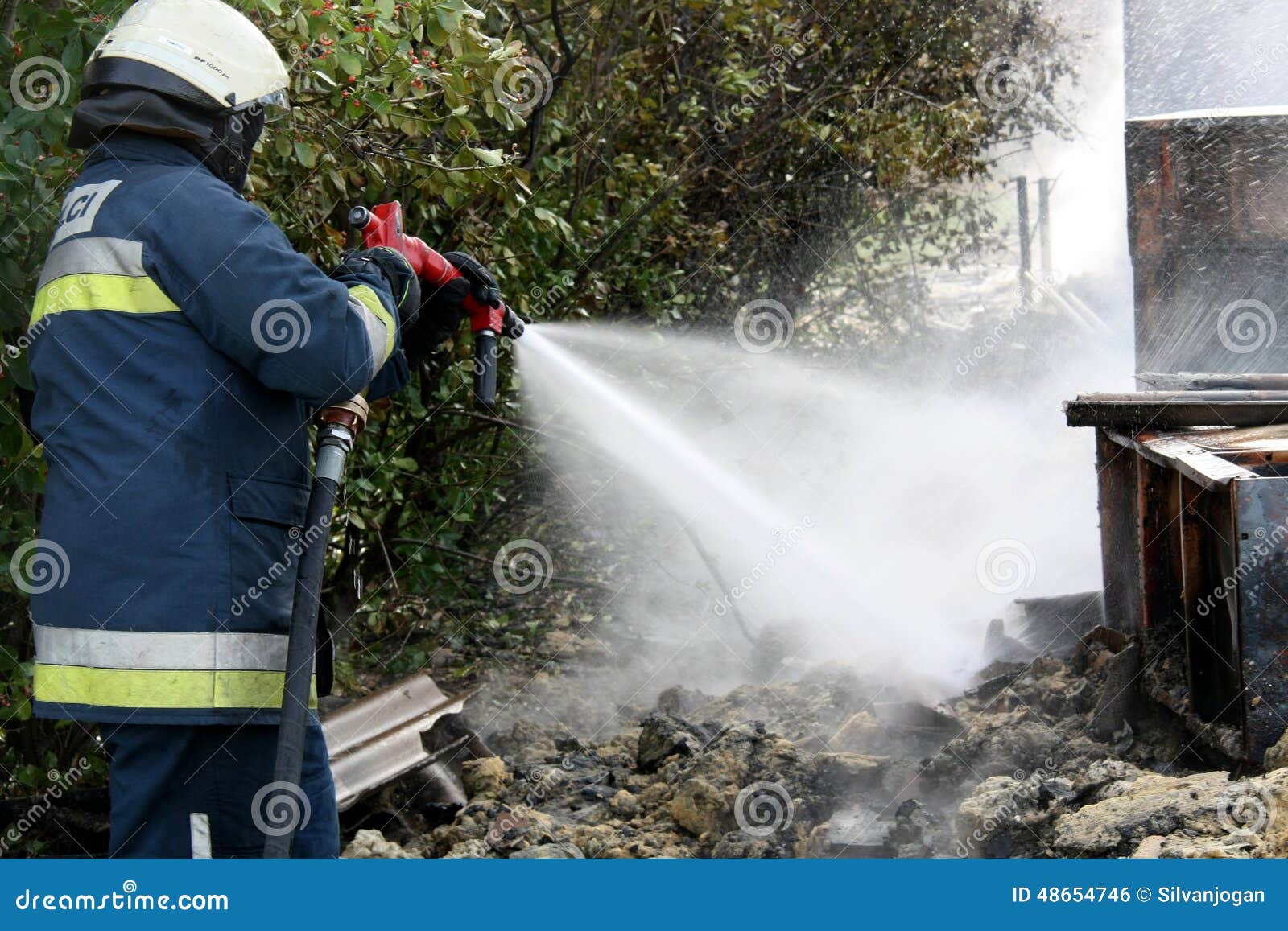 Firefighter in action editorial photo. Image of white - 48654746