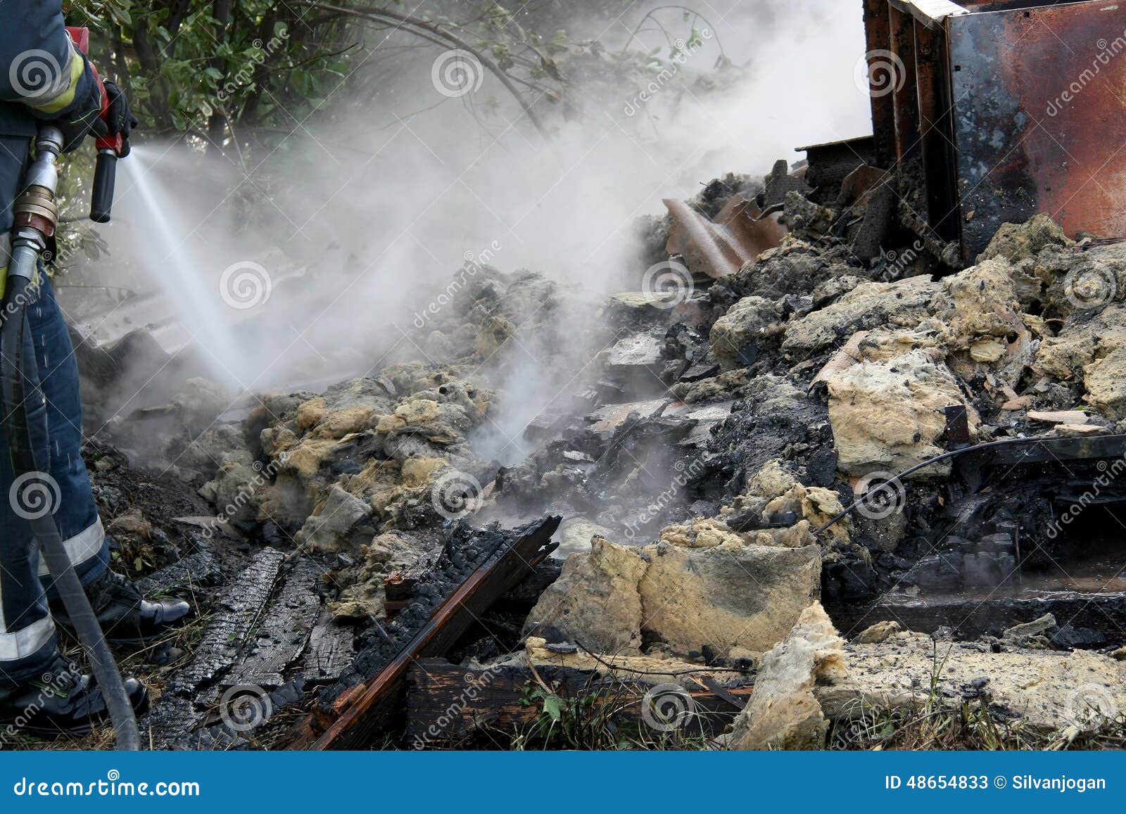 Firefighter in action stock image. Image of gasoline - 48654833