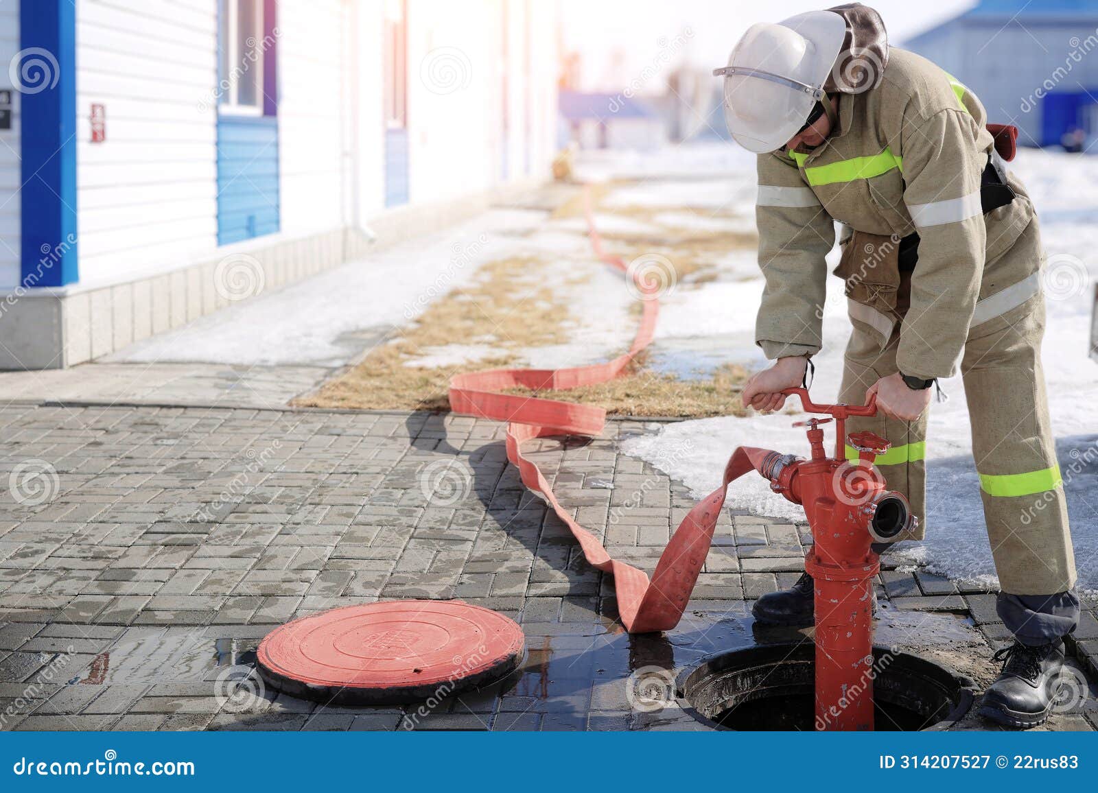 Firefighter Attaching Hose To Hydrant Stock Image - Image of scenario ...