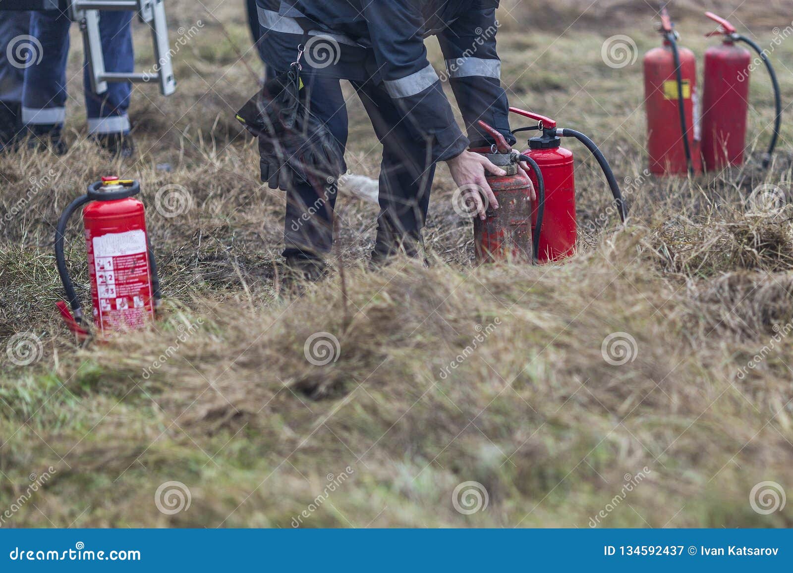 Firefighter Checks Fire Extinguishers during Training and Practice ...