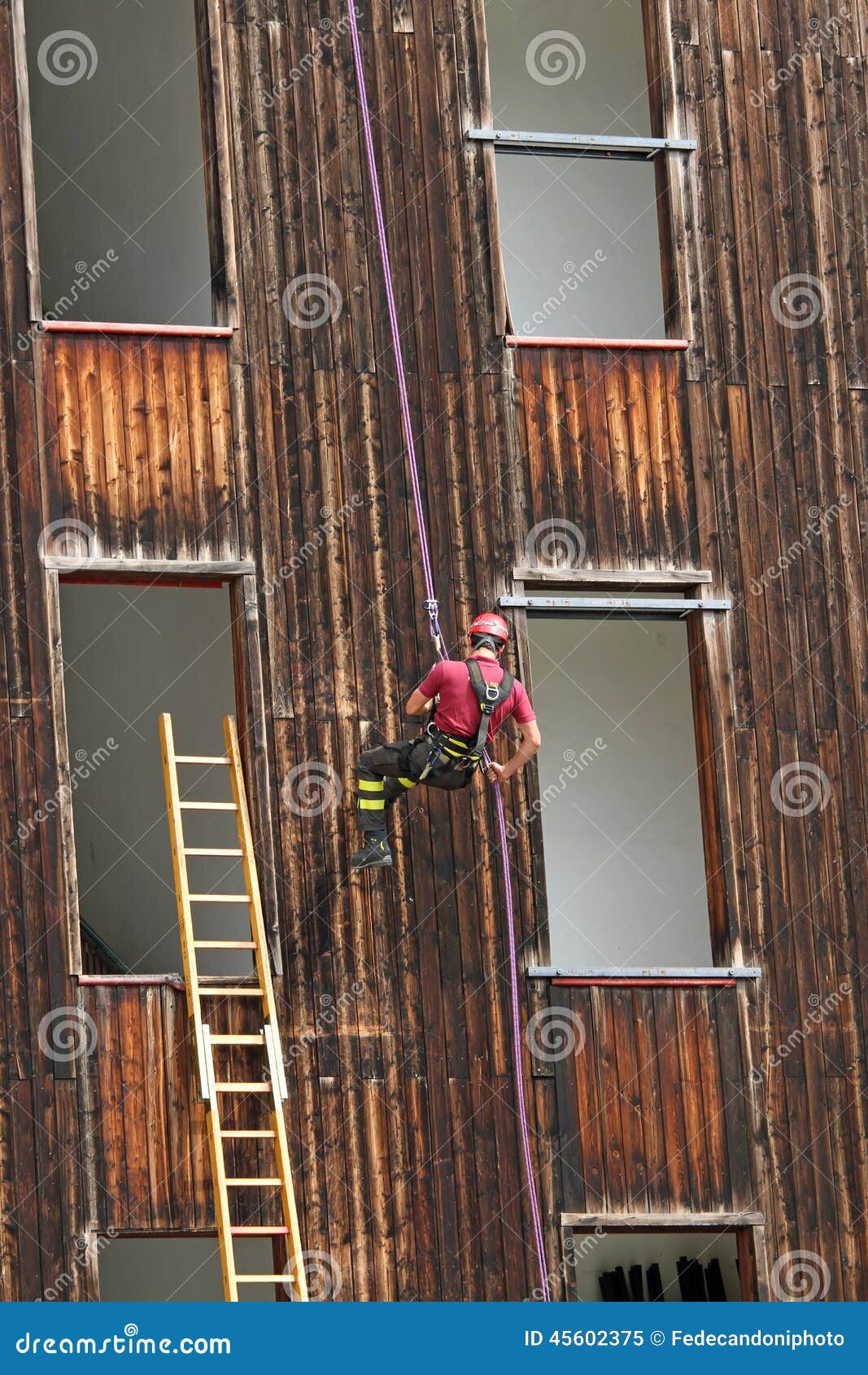 Firefighter Climbing during the Ascent Abseiling from a Building ...