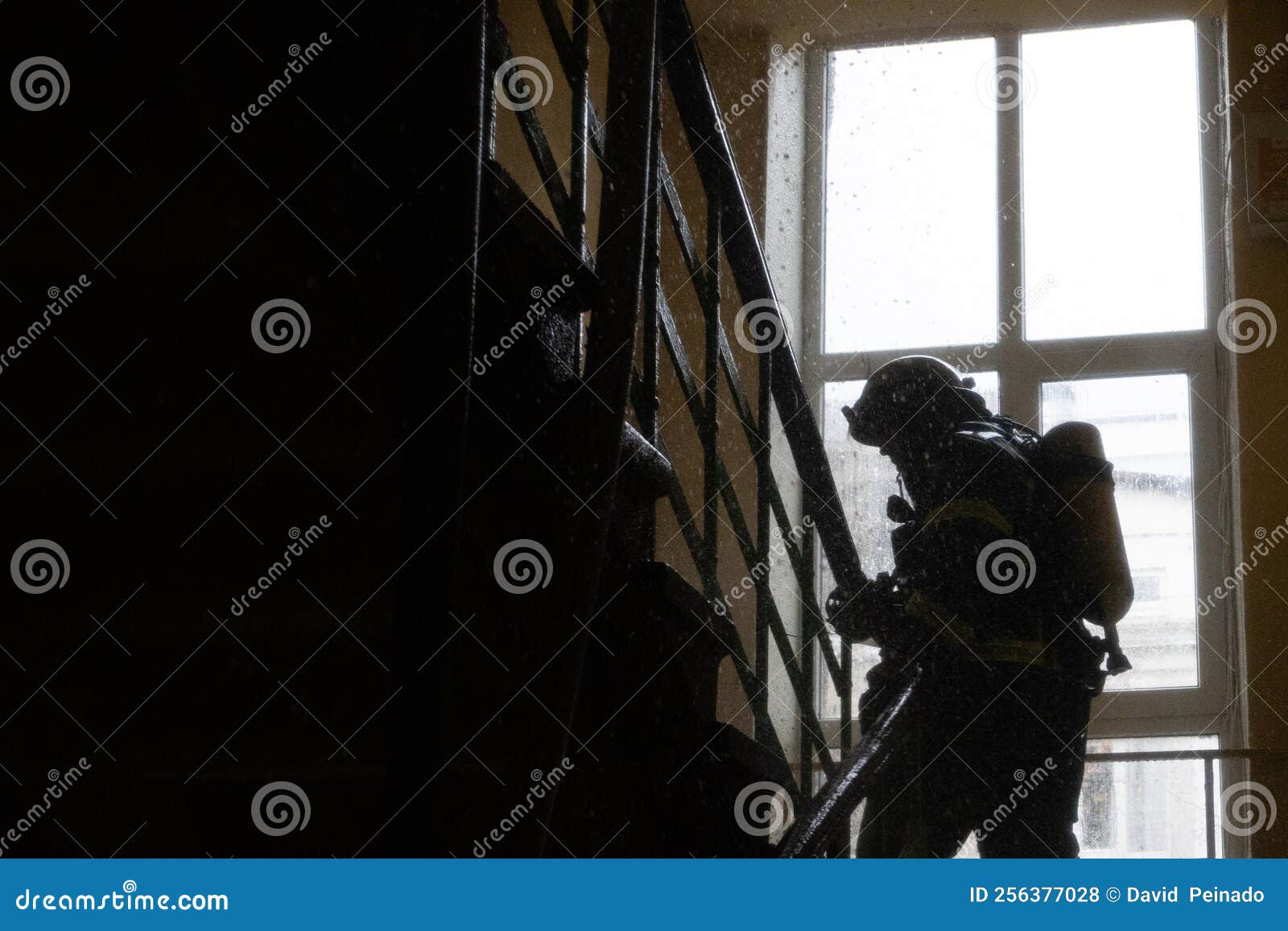 Firefighter Climbs The Stairs Of A Building Set On Fire By A Russian ...